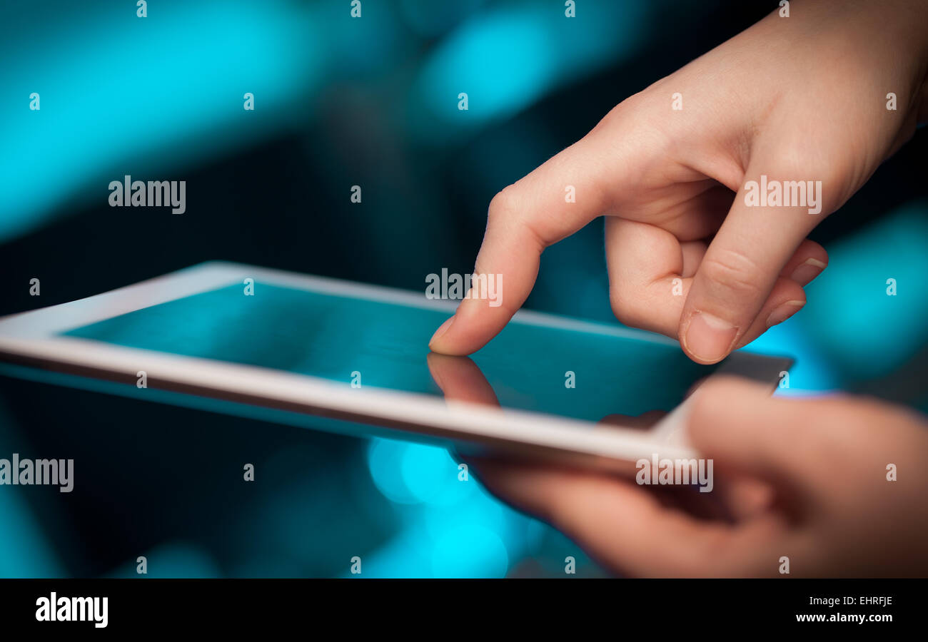 Finger pointing on tablet pc with empty space Stock Photo - Alamy