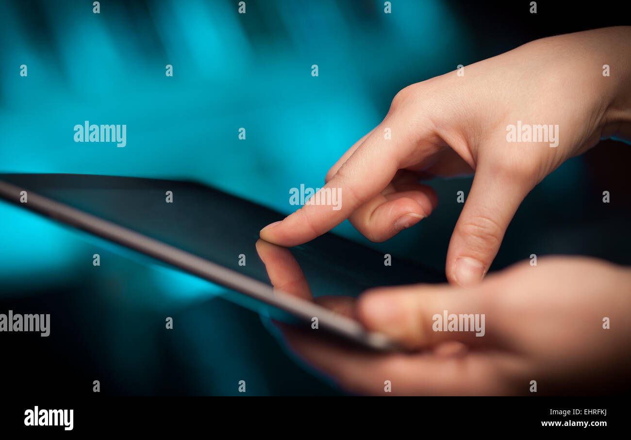 Finger pointing on tablet pc with empty space Stock Photo - Alamy