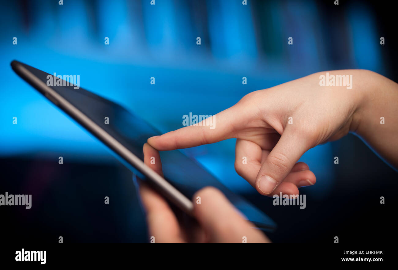Finger pointing on tablet pc with empty space Stock Photo - Alamy