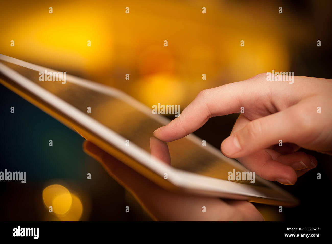 Finger pointing on tablet pc with empty space Stock Photo - Alamy