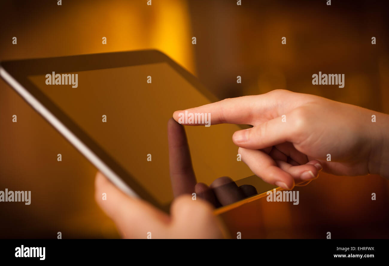 Finger pointing on tablet pc with empty space Stock Photo - Alamy