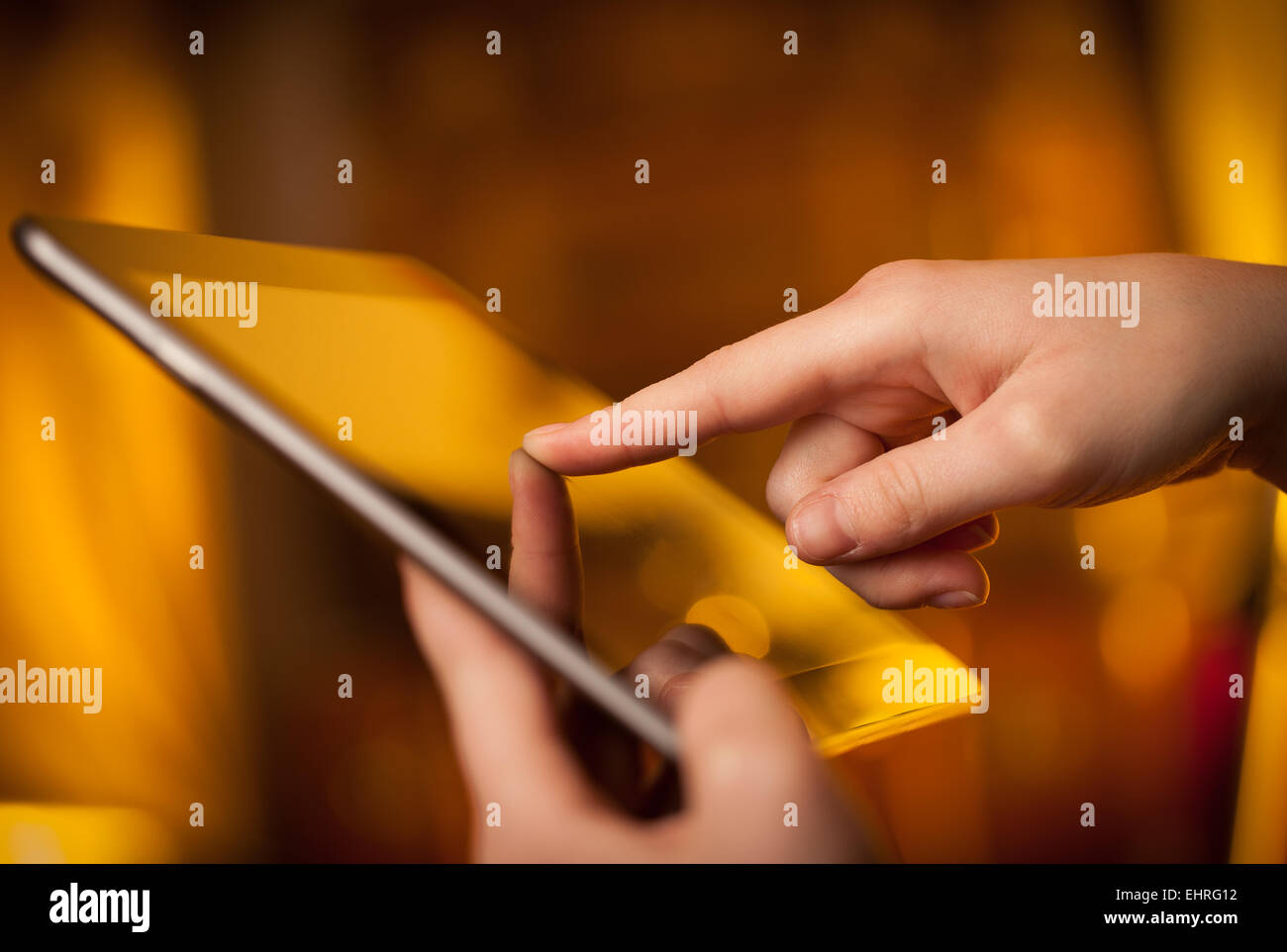 Finger pointing on tablet pc with empty space Stock Photo - Alamy