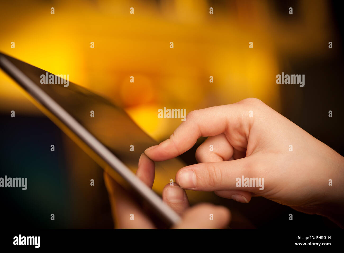 Finger pointing on tablet pc with empty space Stock Photo - Alamy