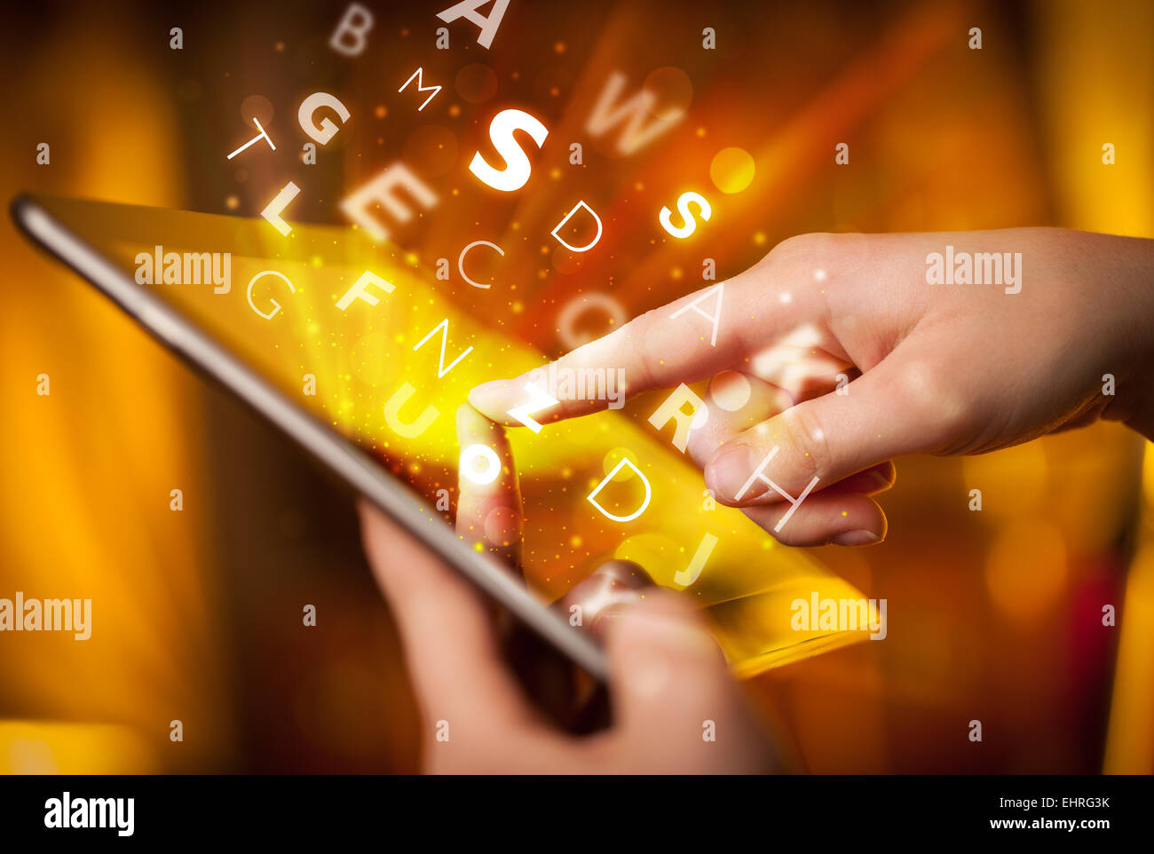 Finger pointing on tablet pc, letters concept Stock Photo - Alamy
