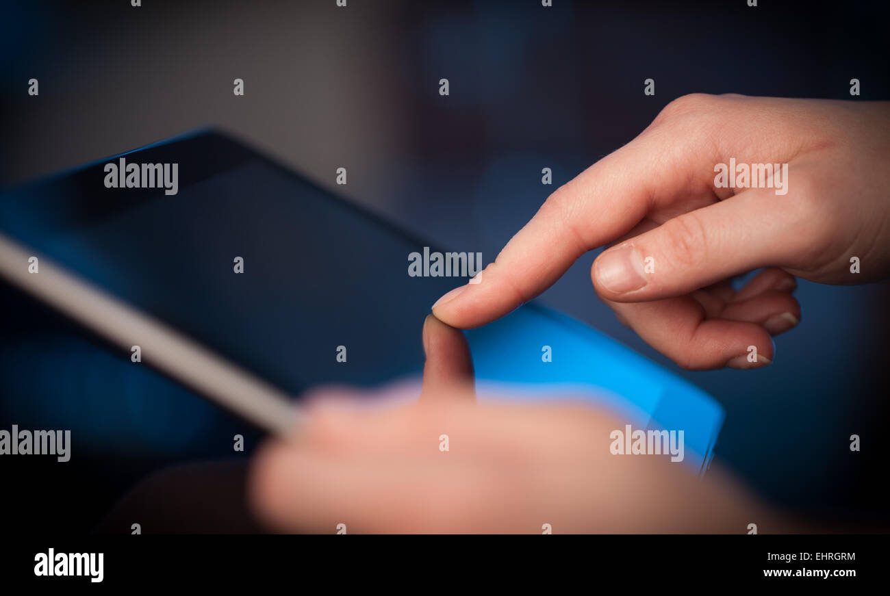 Finger pointing on tablet pc with empty space Stock Photo - Alamy