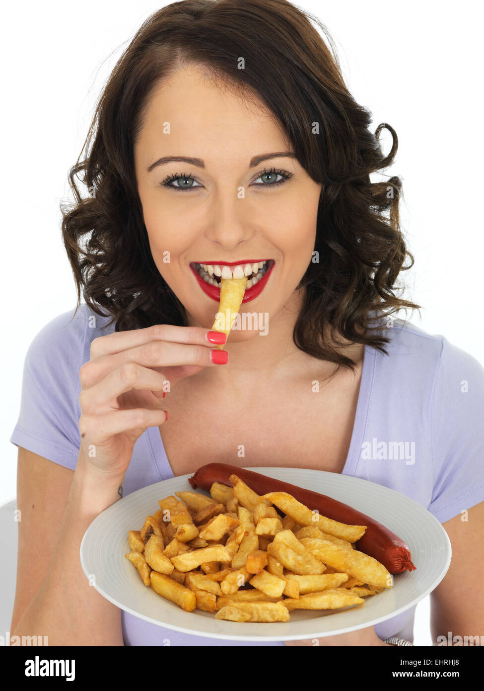 Woman eating fish and chips isolated hi-res stock photography and ...
