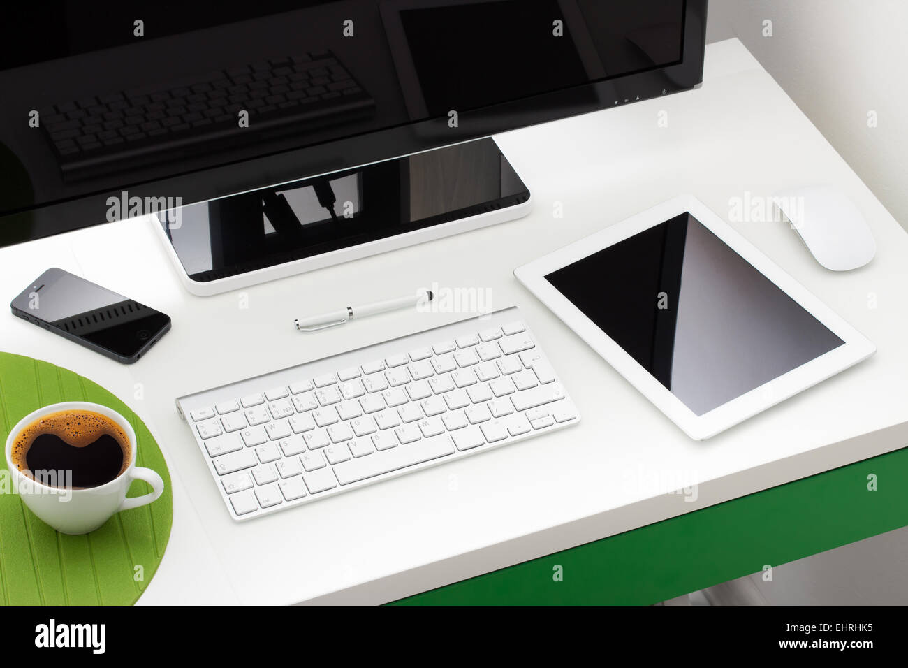 Computer desk with monitor and keyboard, workplace Stock Photo - Alamy