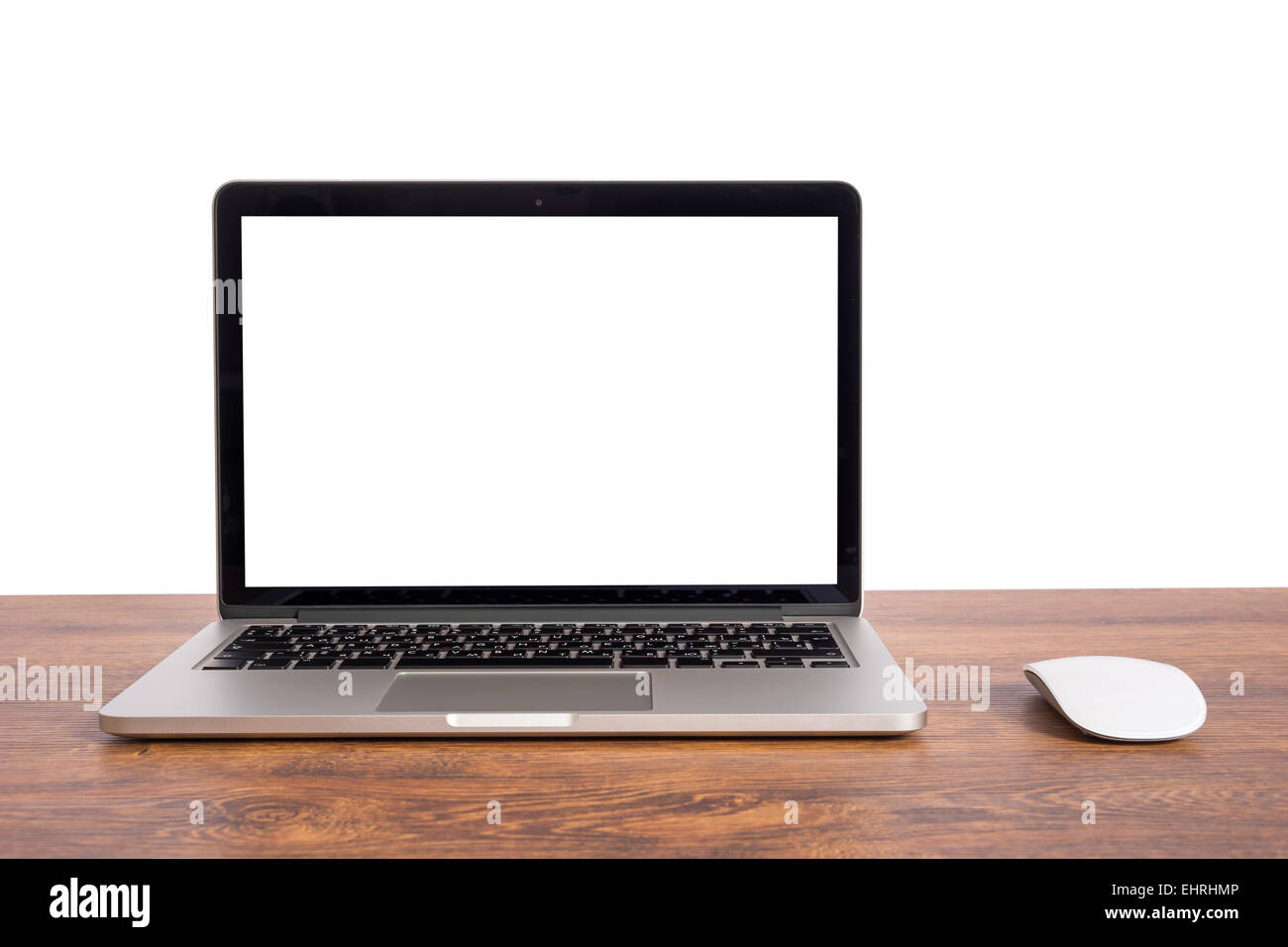 Open laptop with isolated white screen on old wooden desk Stock Photo ...