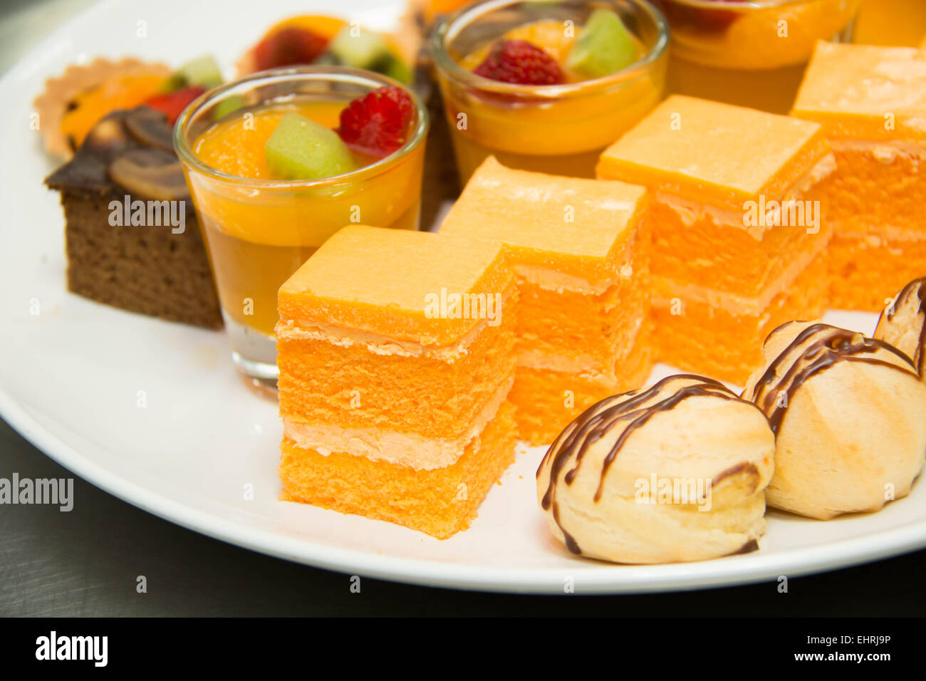 A Collection of delicious assorted mini dessert Stock Photo - Alamy