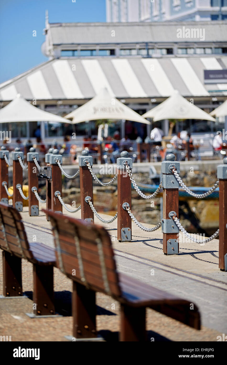 Wooden benches at the harbour Stock Photo - Alamy