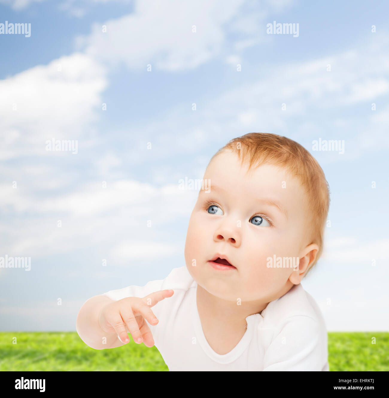 curious baby looking side Stock Photo - Alamy