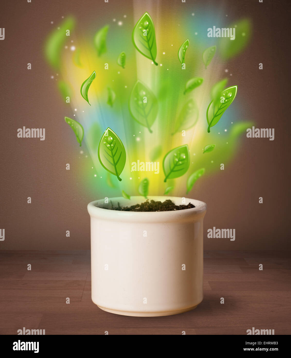 Glowing leaves coming out of flowerpot Stock Photo - Alamy
