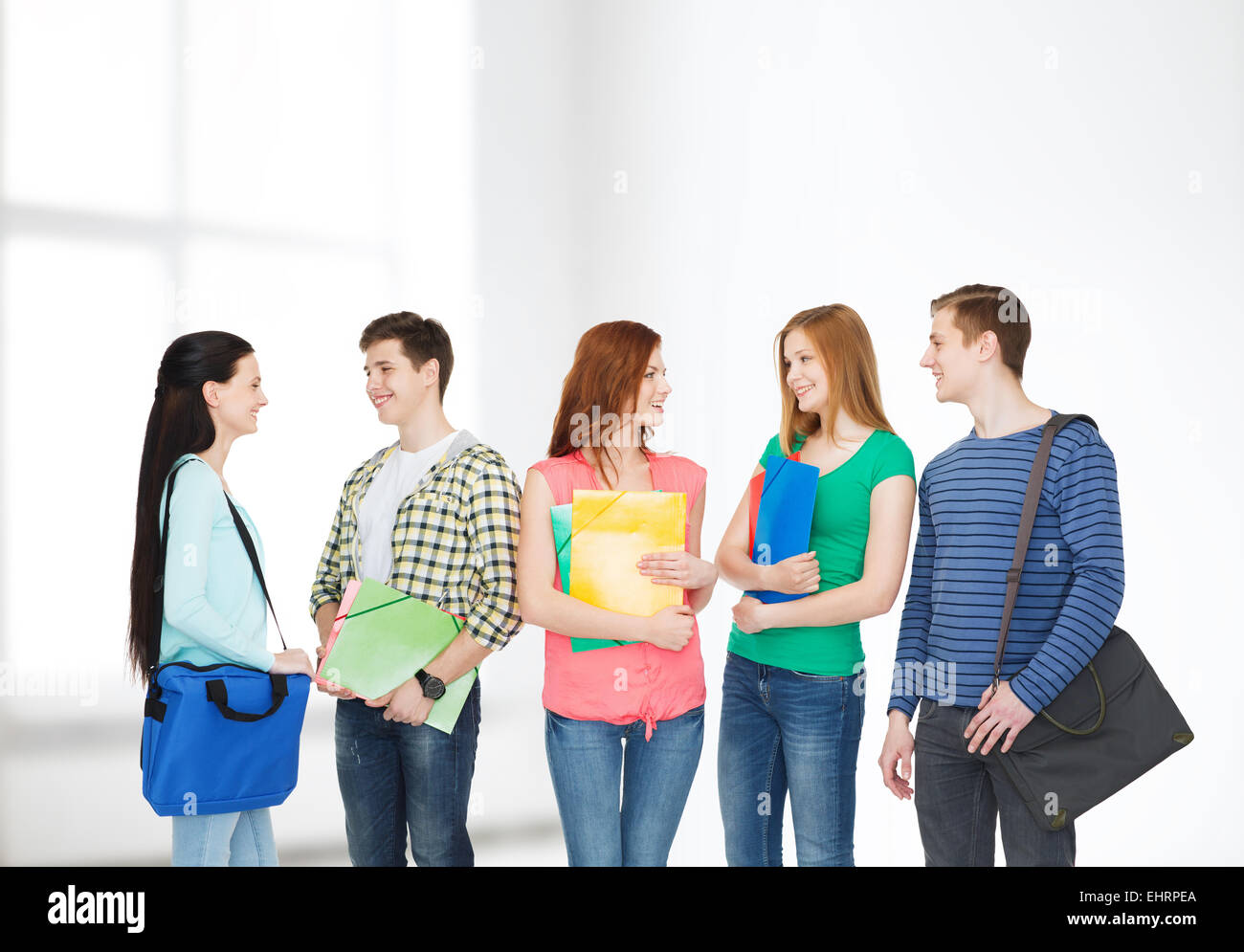 group of smiling students standing Stock Photo - Alamy