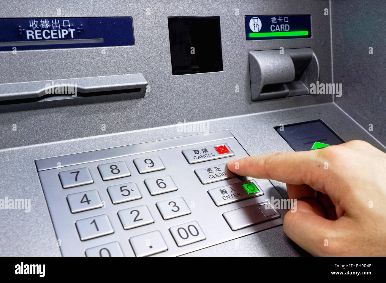 ATM - entering pin close up Stock Photo - Alamy