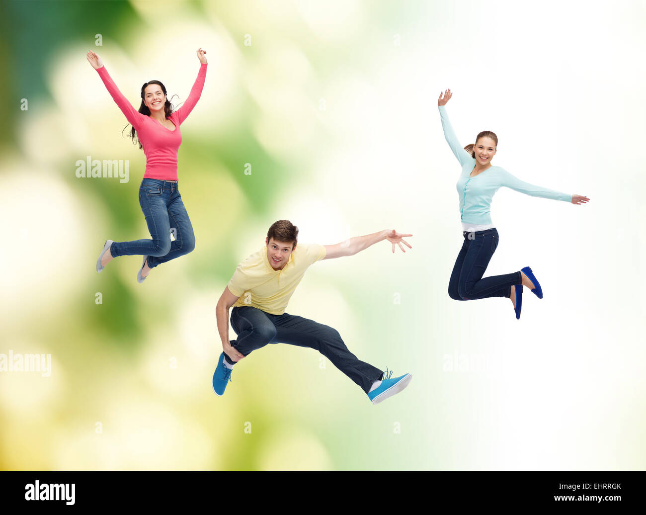 group of smiling teenagers jumping in air Stock Photo - Alamy