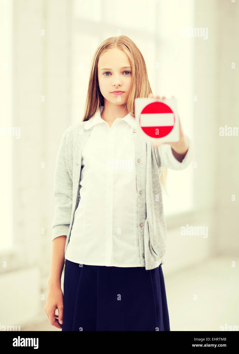 girl showing stop sign Stock Photo - Alamy