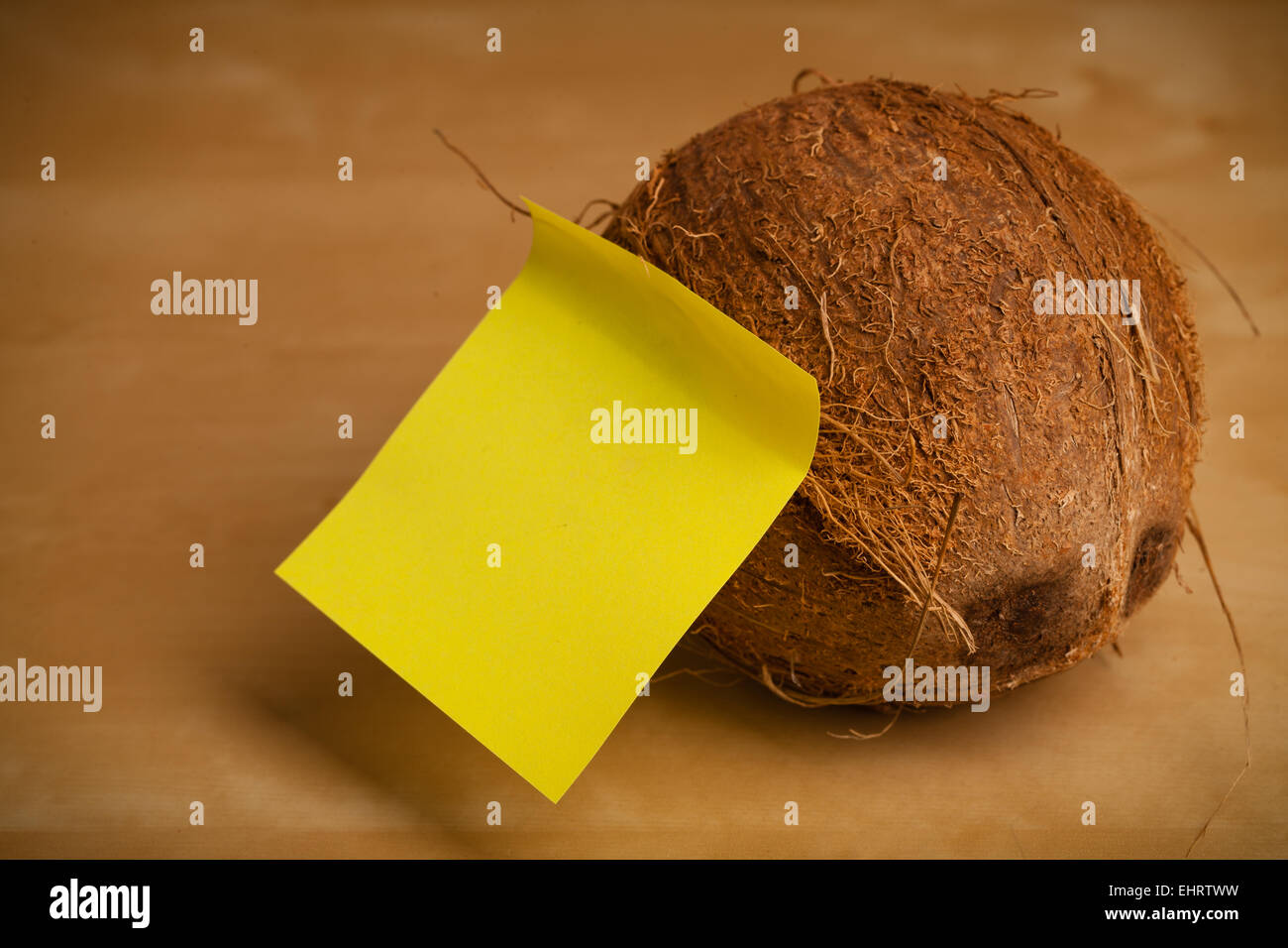 Empty post-it note sticked on coconut Stock Photo - Alamy