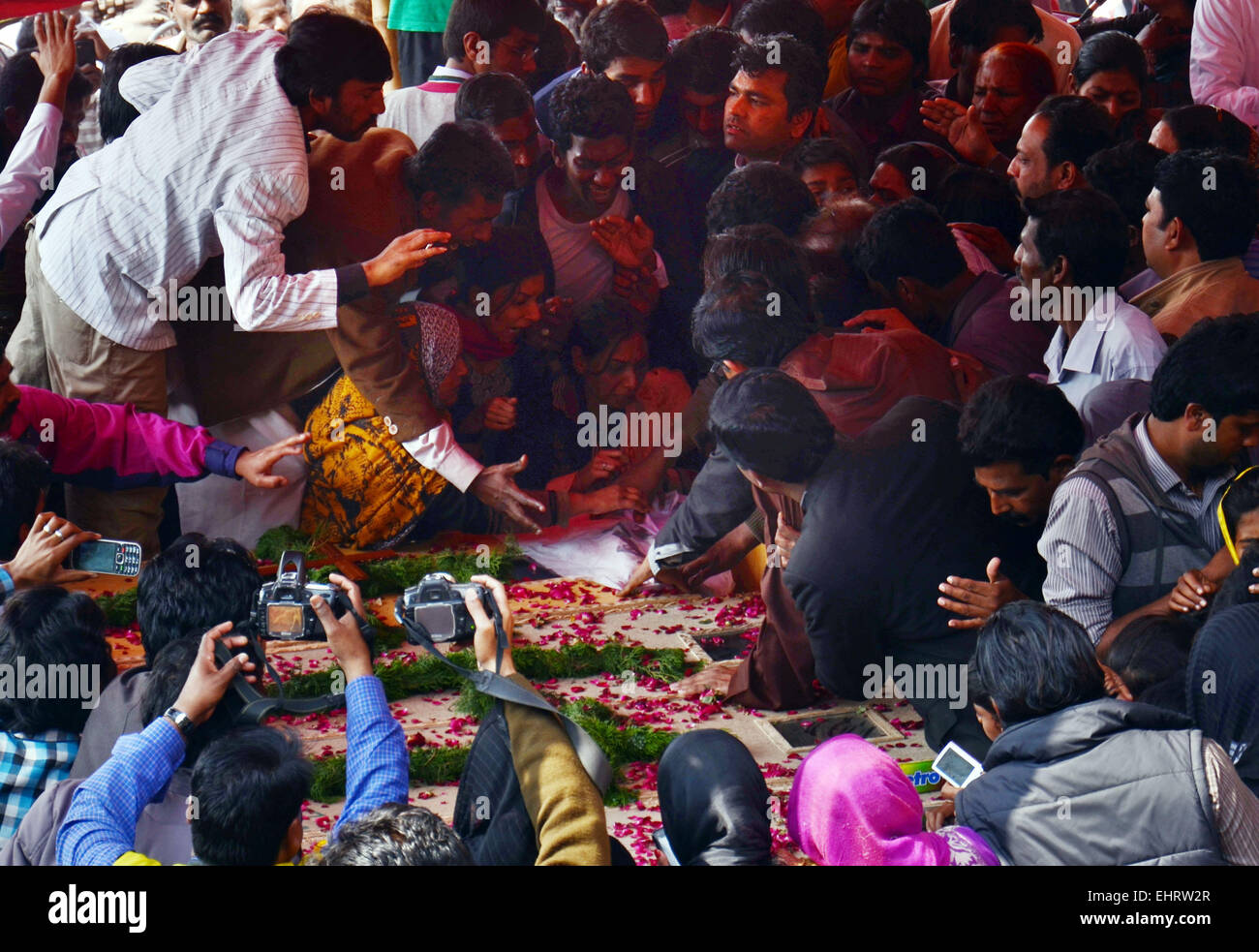 Pakistani Christian community carry the coffin of a victim during a ...