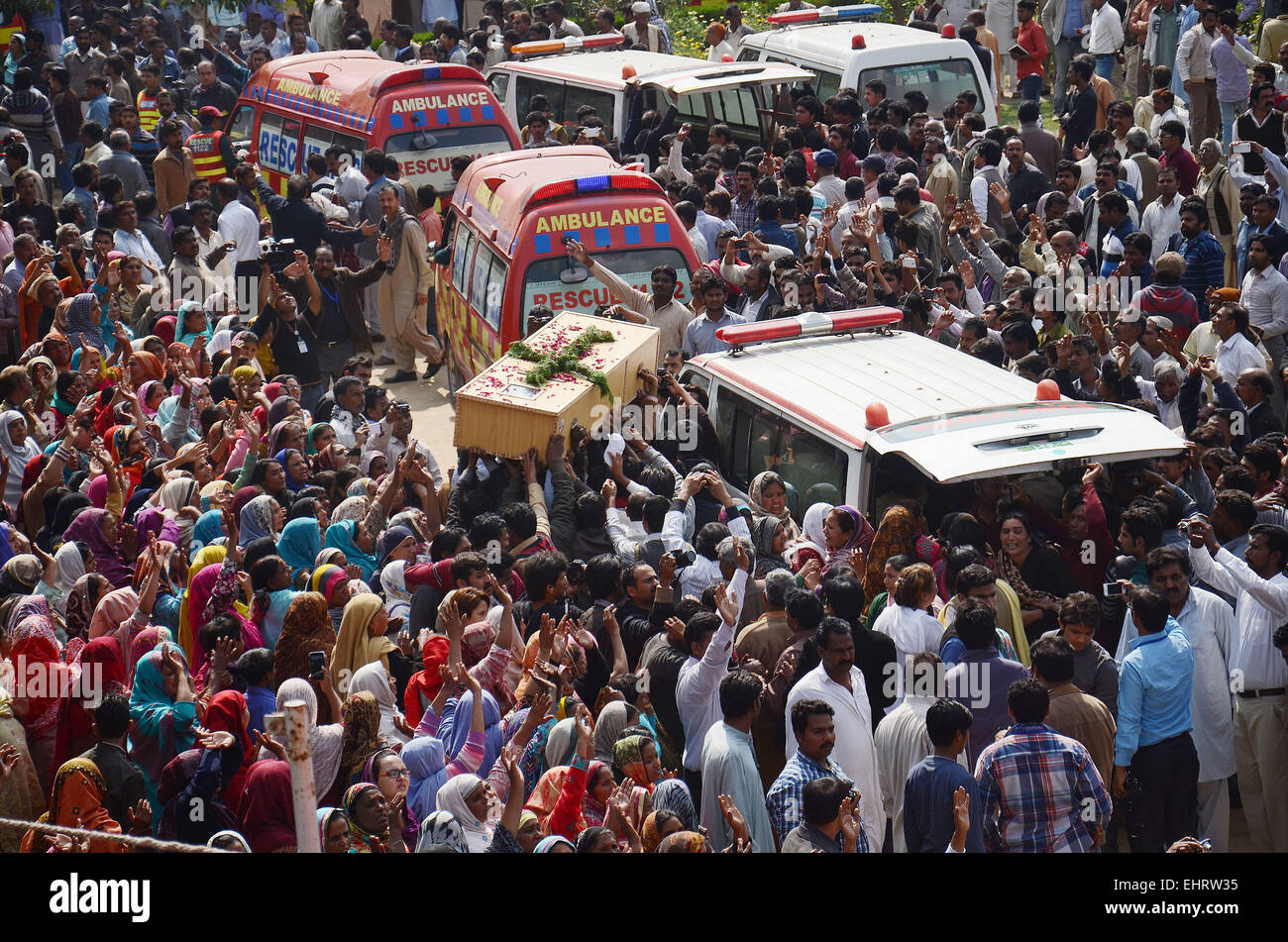 Pakistani Christian community carry the coffin of a victim during a ...