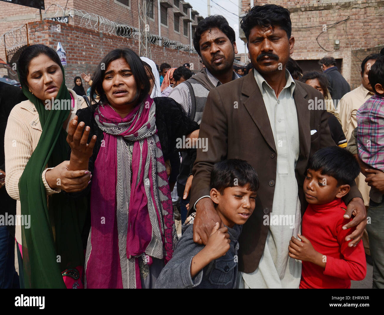 Pakistani Christian community carry the coffin of a victim during a ...