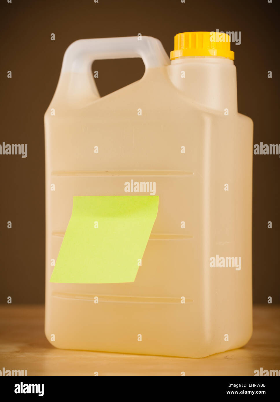 Empty post-it note sticked on gallon Stock Photo - Alamy