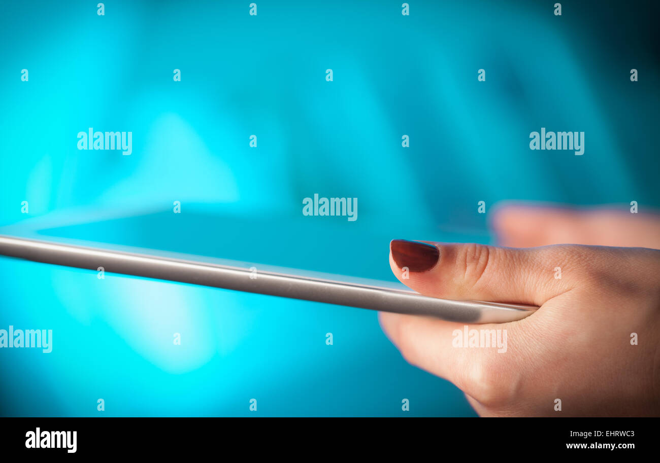 Finger pointing on tablet pc with empty space Stock Photo - Alamy