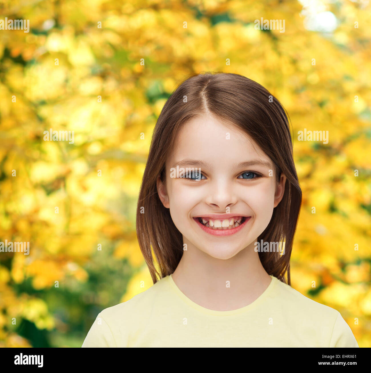 smiling little girl over white background Stock Photo - Alamy