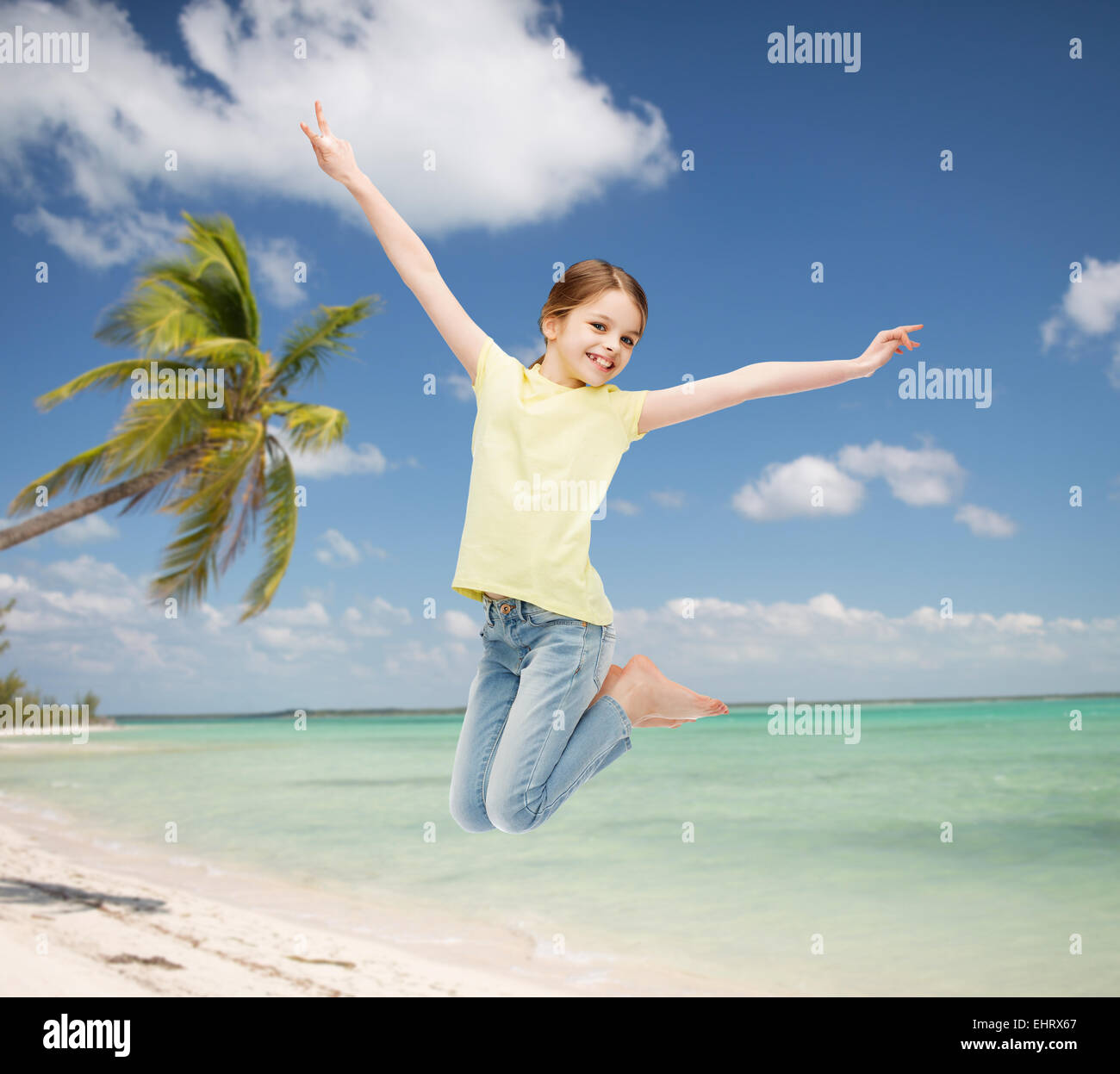 Child jumping hands air hi-res stock photography and images - Alamy