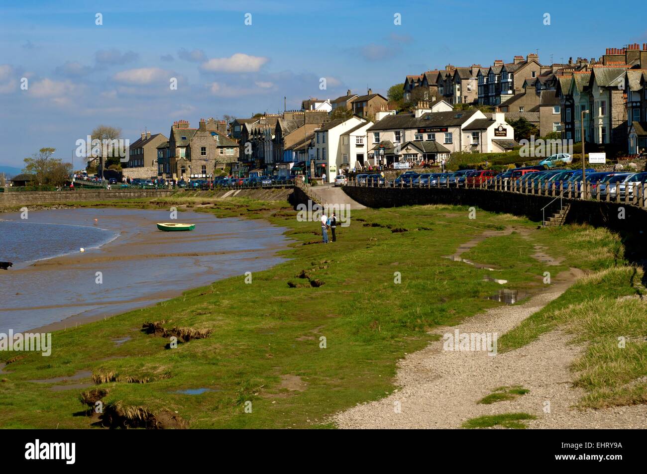 Coastal town in England showing the sandy beach with boats ashore and ...