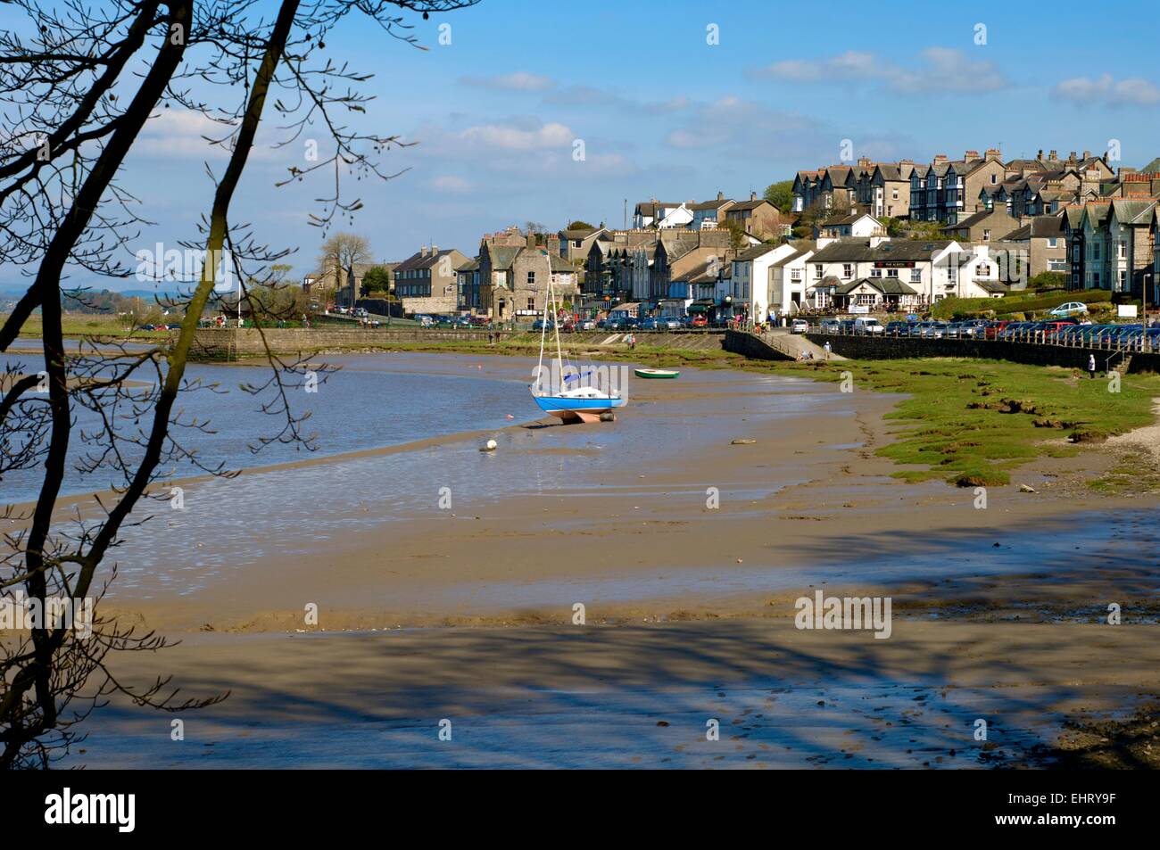 Coastal town in England showing the sandy beach with boats ashore and ...