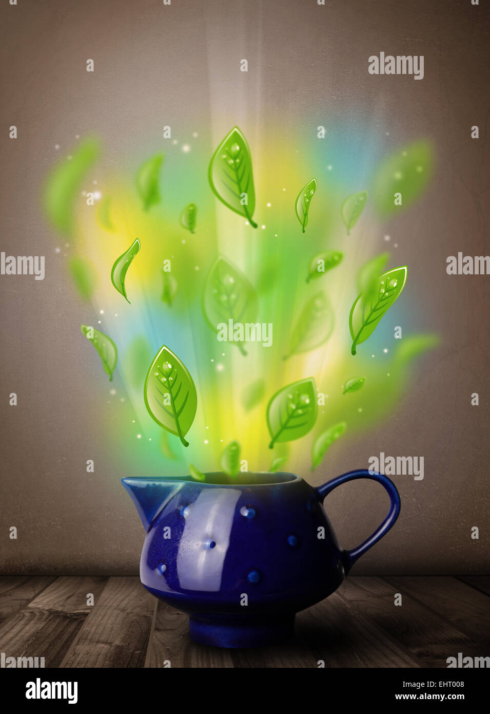 Tea pot with leaves and colorful abstract lights Stock Photo - Alamy