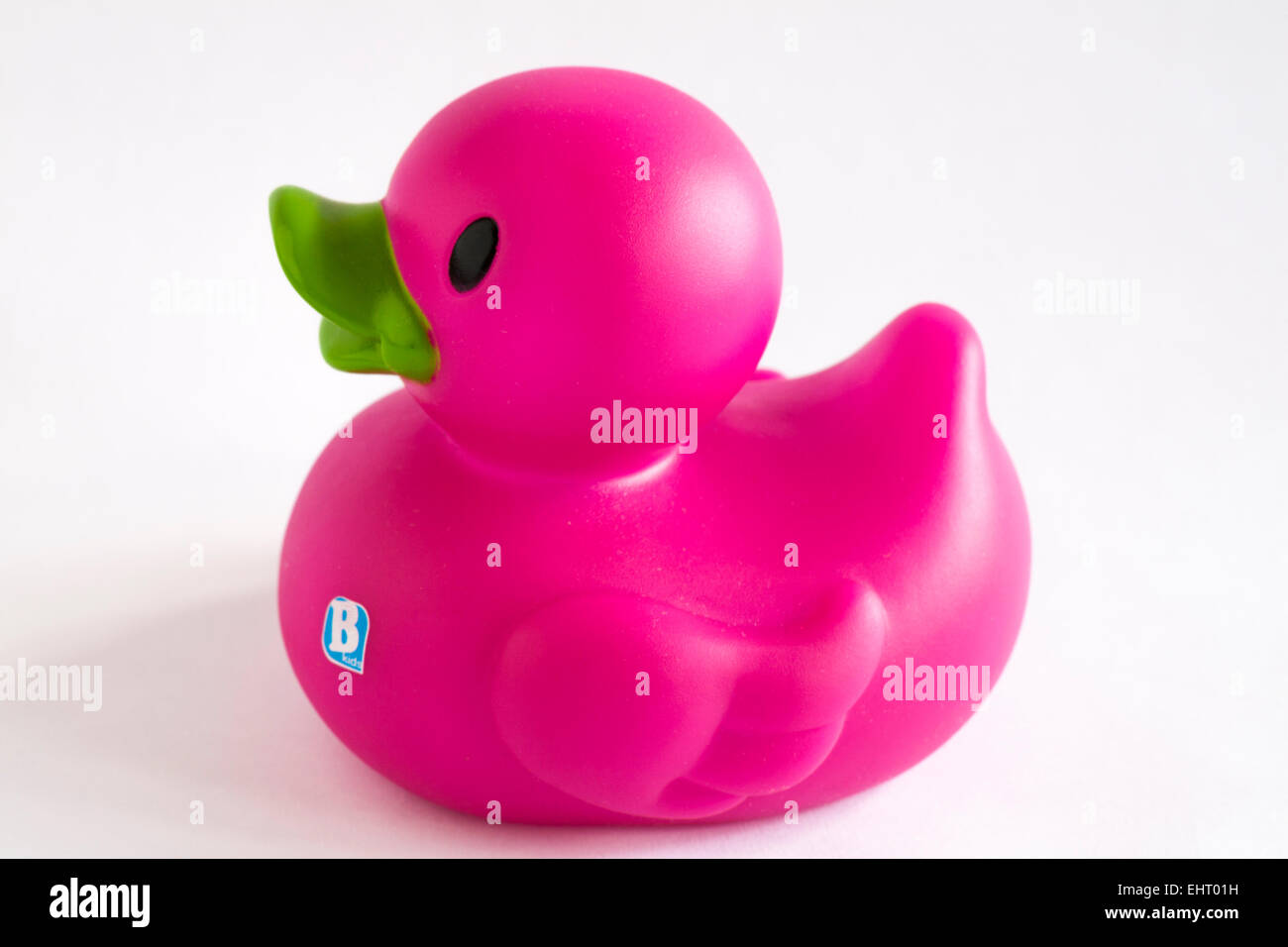 fun toy pink rubber duck with green beak isolated on white background ...