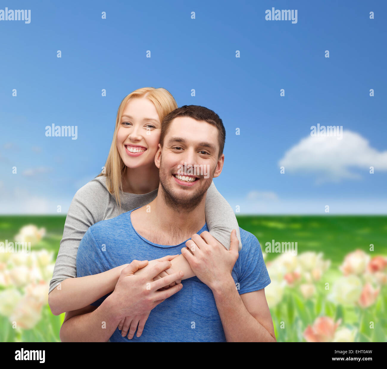 smiling couple hugging Stock Photo - Alamy