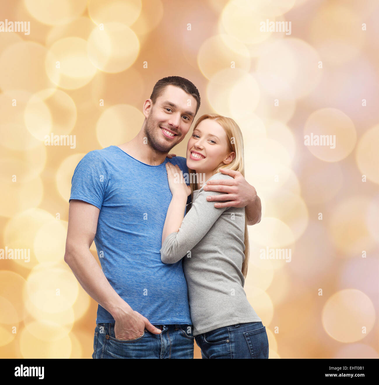 smiling couple hugging Stock Photo - Alamy
