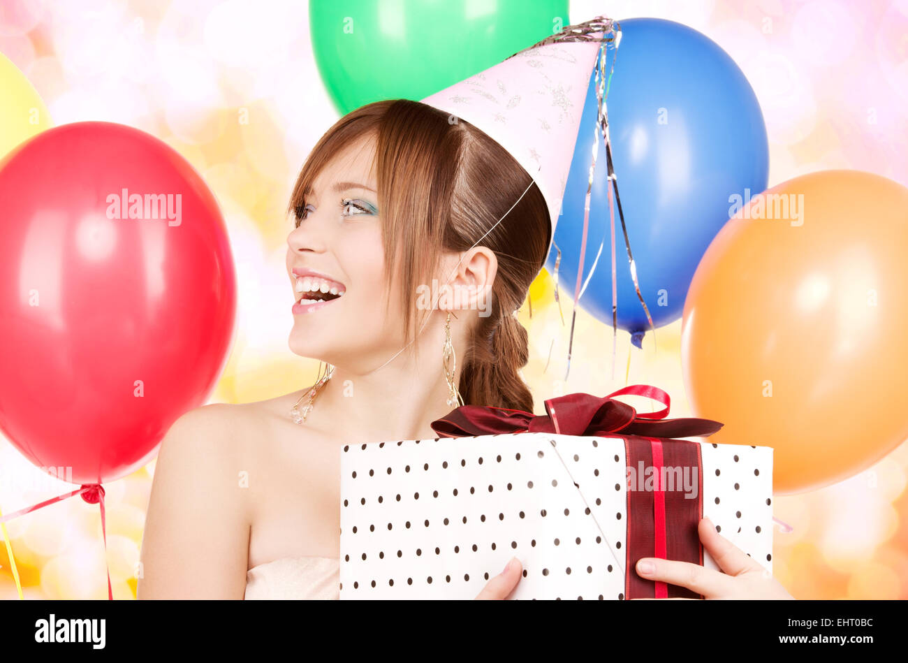 party girl with balloons and gift box Stock Photo - Alamy