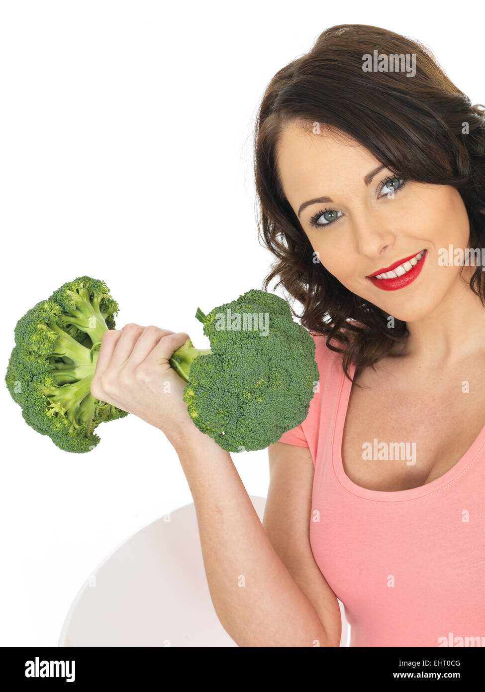 Young Attractive Woman Holding Raw Broccoli Stock Photo - Alamy