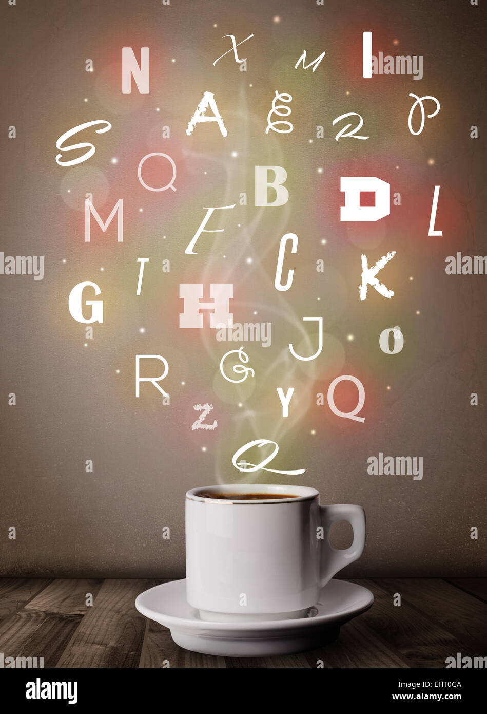 Coffee cup with colorful letters Stock Photo - Alamy