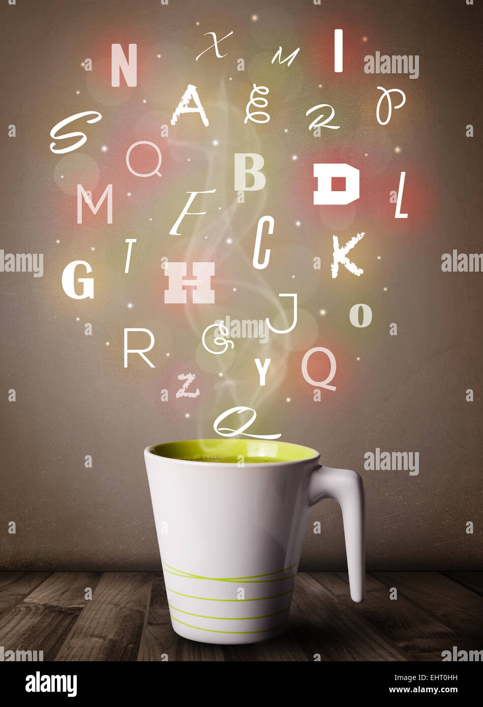 Coffee cup with colorful letters Stock Photo - Alamy