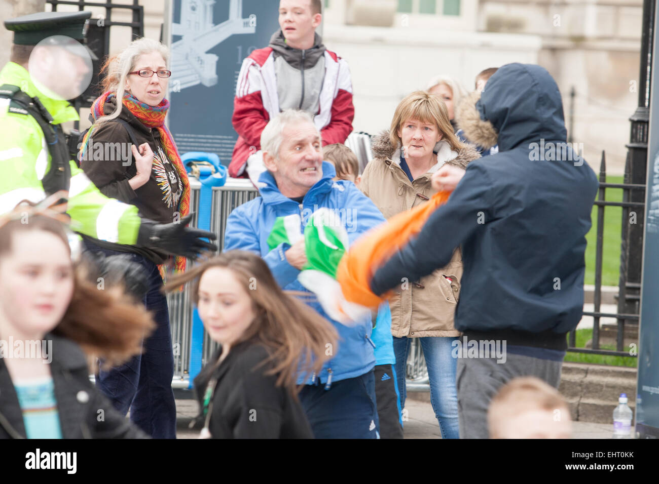Belfast UK. 17th March 2015 Young people run away after a scuffle ...
