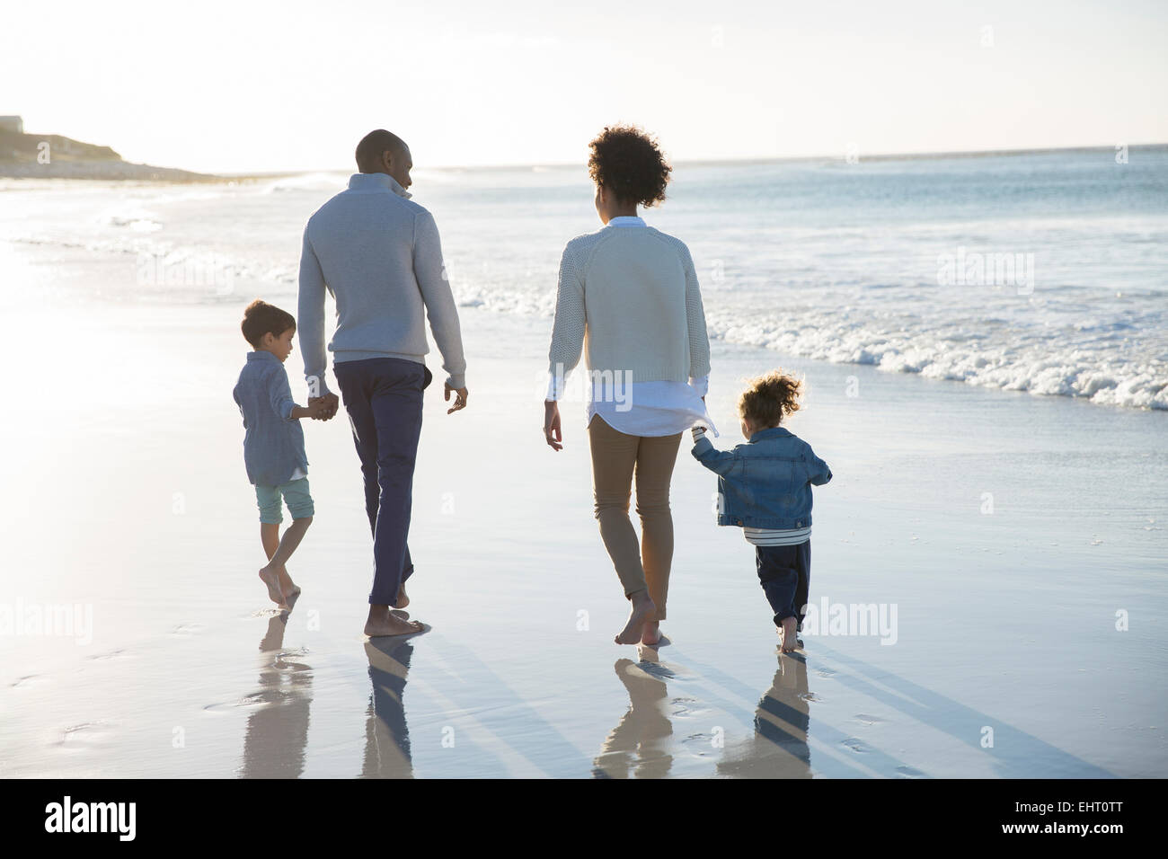 Three generation family holding hands hi-res stock photography and ...