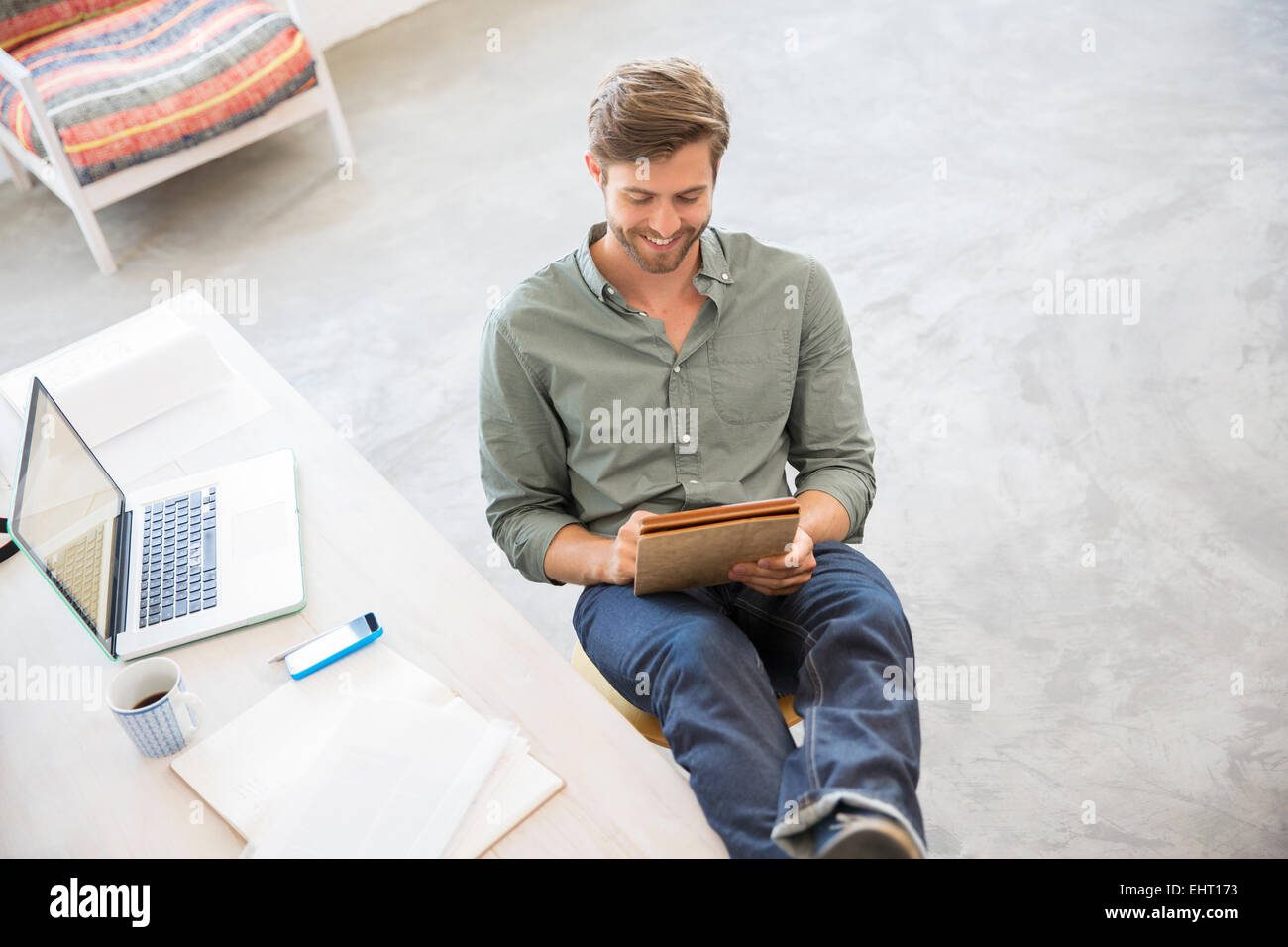 Portrait man seated desk hi-res stock photography and images - Alamy