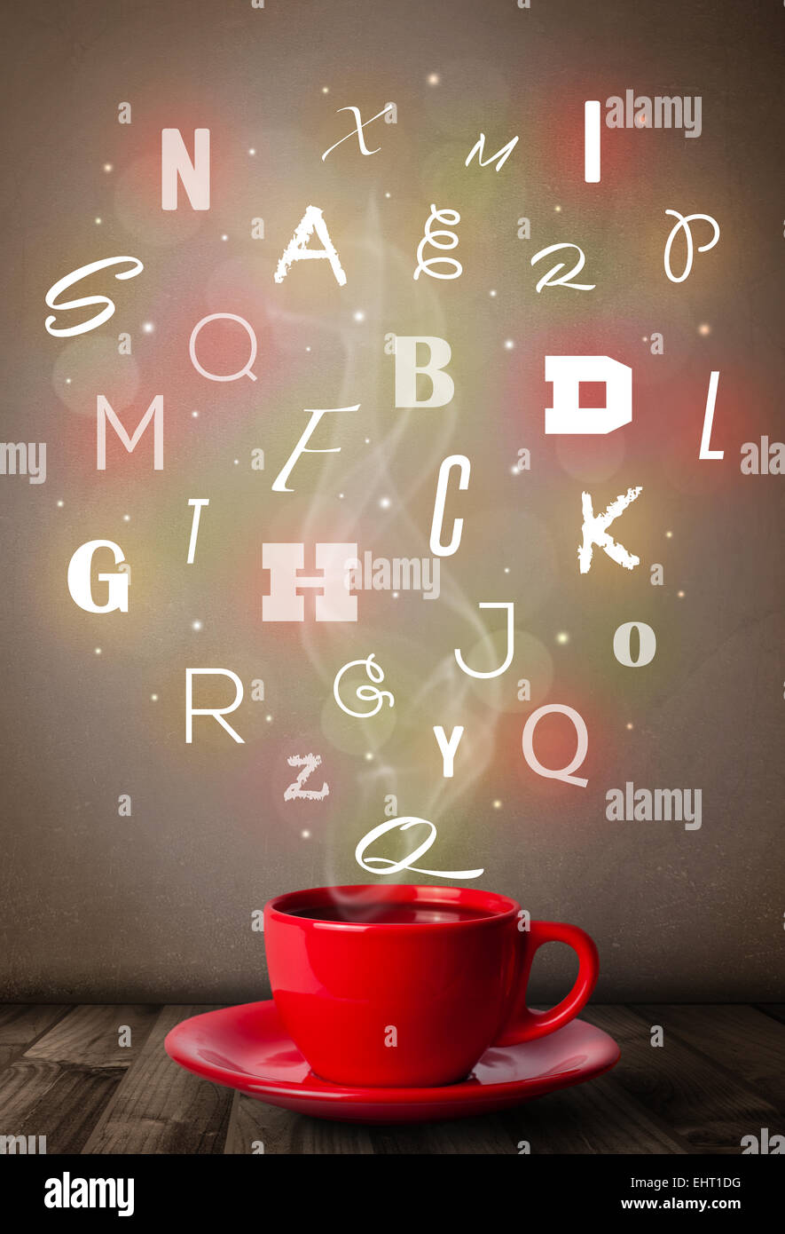 Coffee cup with colorful letters Stock Photo - Alamy
