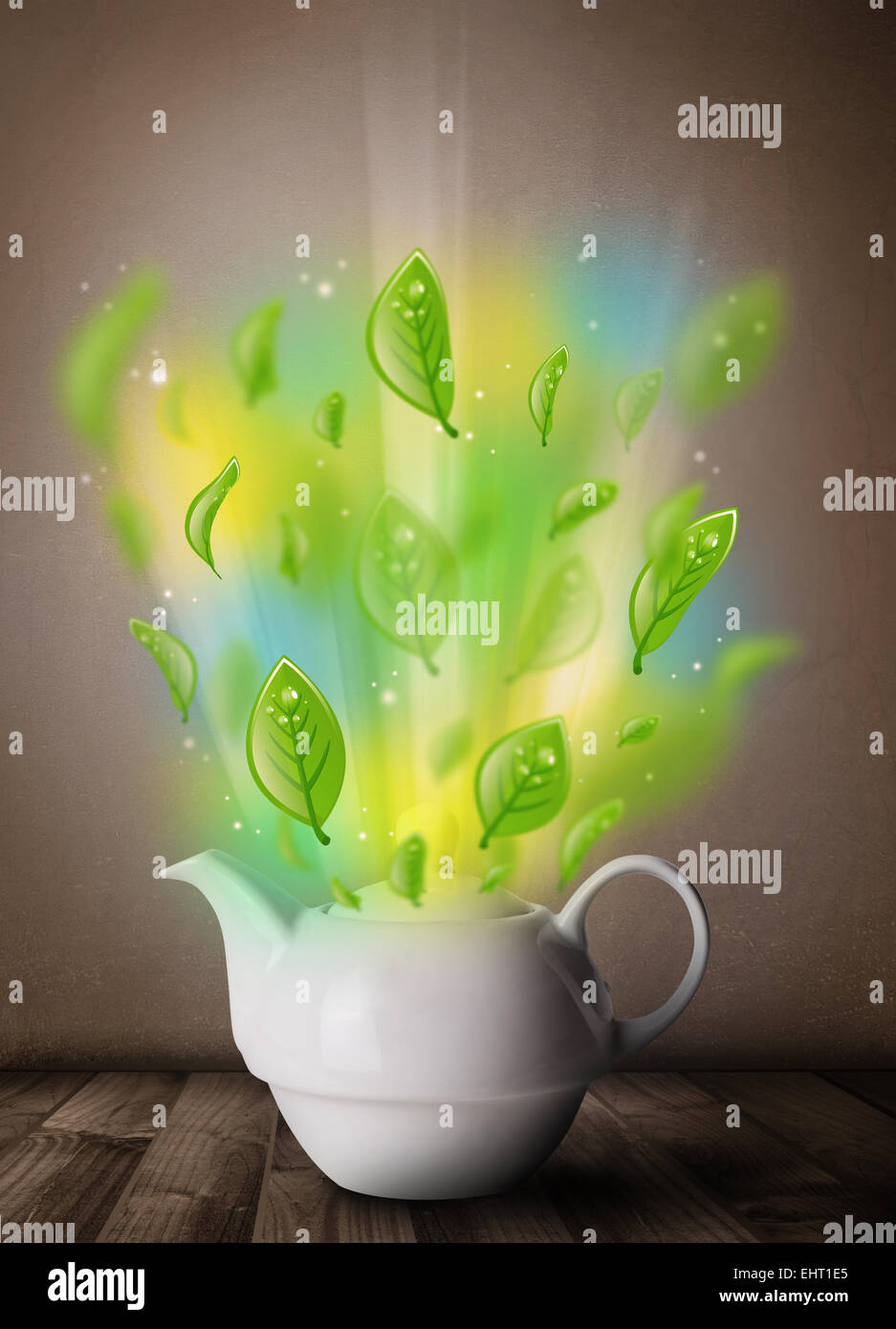 Tea pot with leaves and colorful abstract lights Stock Photo - Alamy