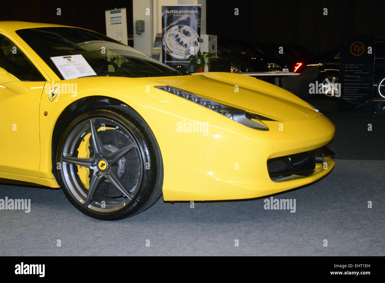 Ferrari yellow color in the showroom Stock Photo - Alamy