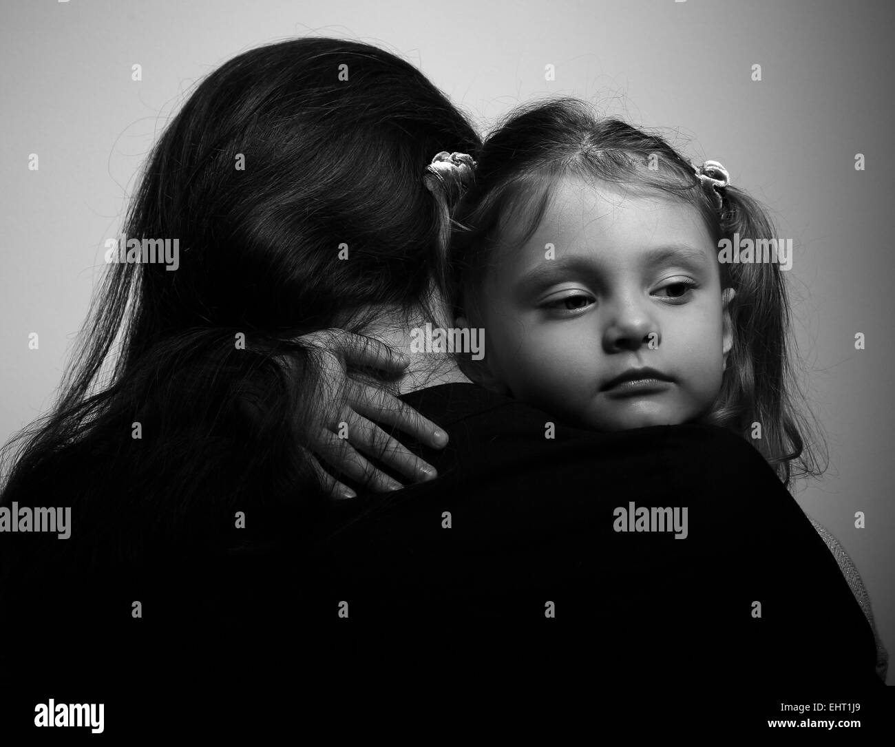 Mother daughter hug sad Black and White Stock Photos & Images - Alamy