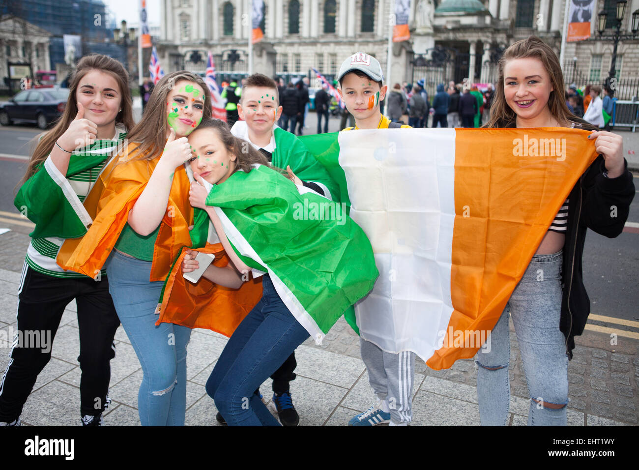 Belfast UK. 17th March 2015 Youths wearing tricolour flags in Belfast ...