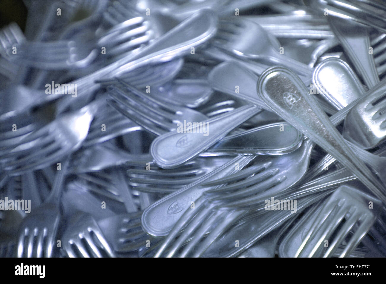Pile of clean forks Stock Photo - Alamy