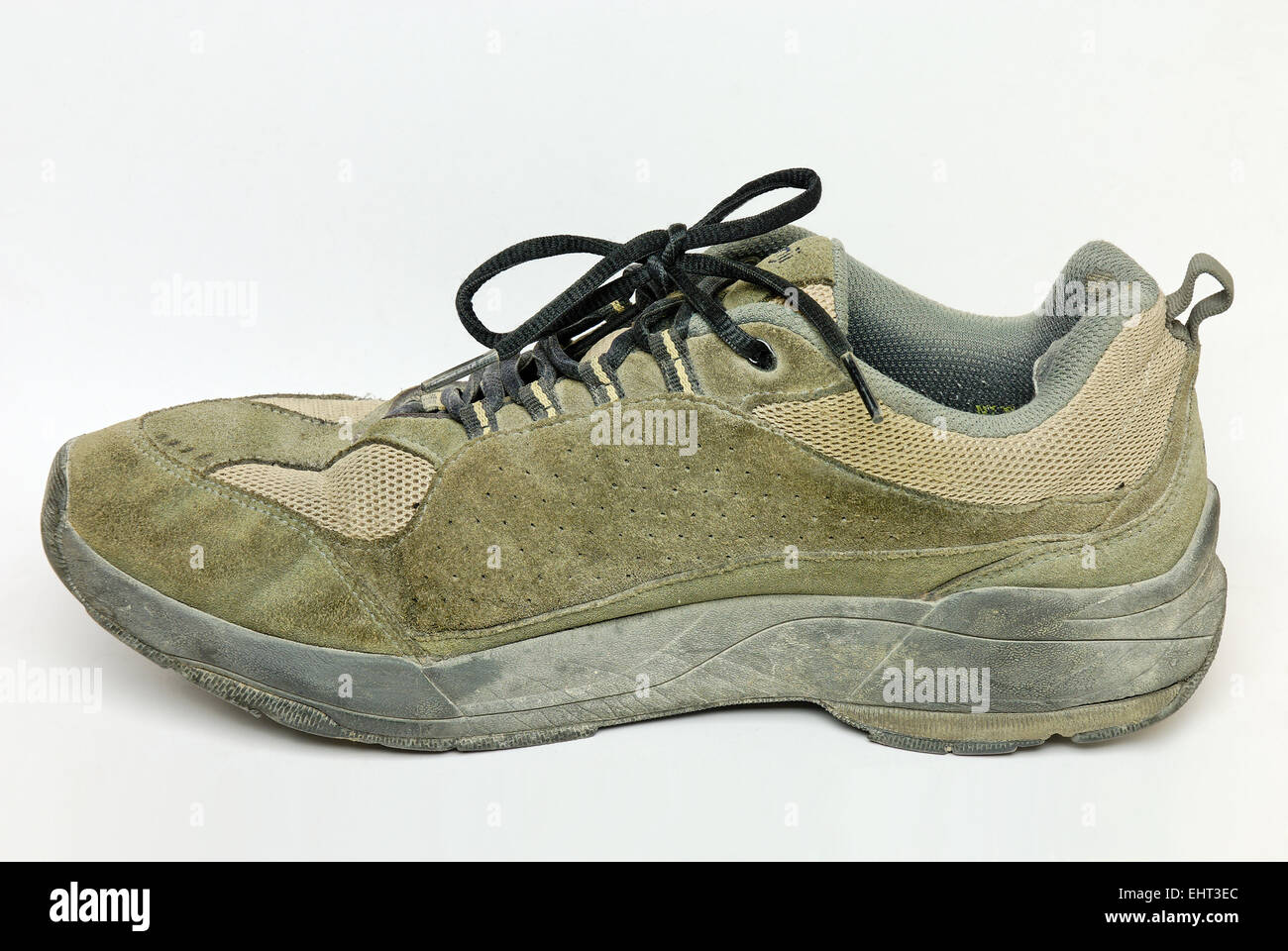 Worn walking shoe isolated Stock Photo - Alamy