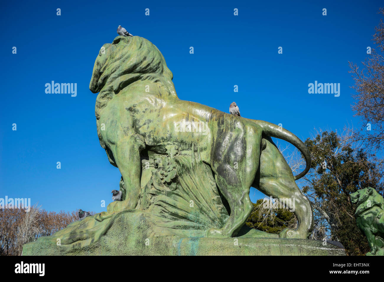 Lion, classical bronze sculptures, Lake in Retiro park, Madrid Spain ...