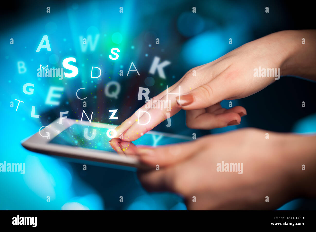 Finger pointing on tablet pc, letters concept Stock Photo - Alamy